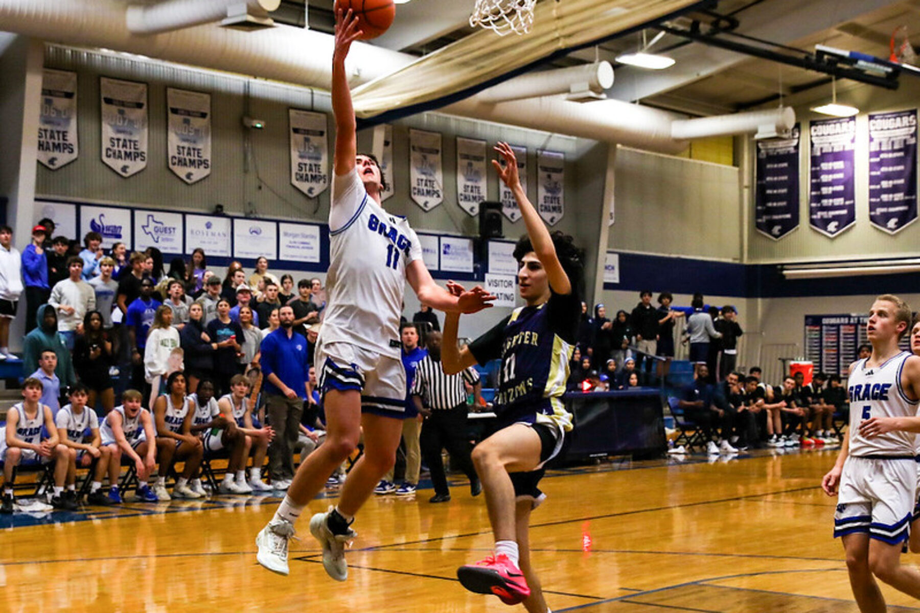 Varsity Men's Basketball Builds Momentum With Overtime Win, Sit Second ...